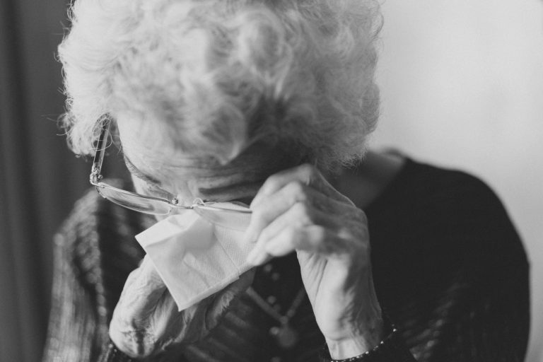 older-lady-wiping-face-with-tissue-scaled-768x512.jpg